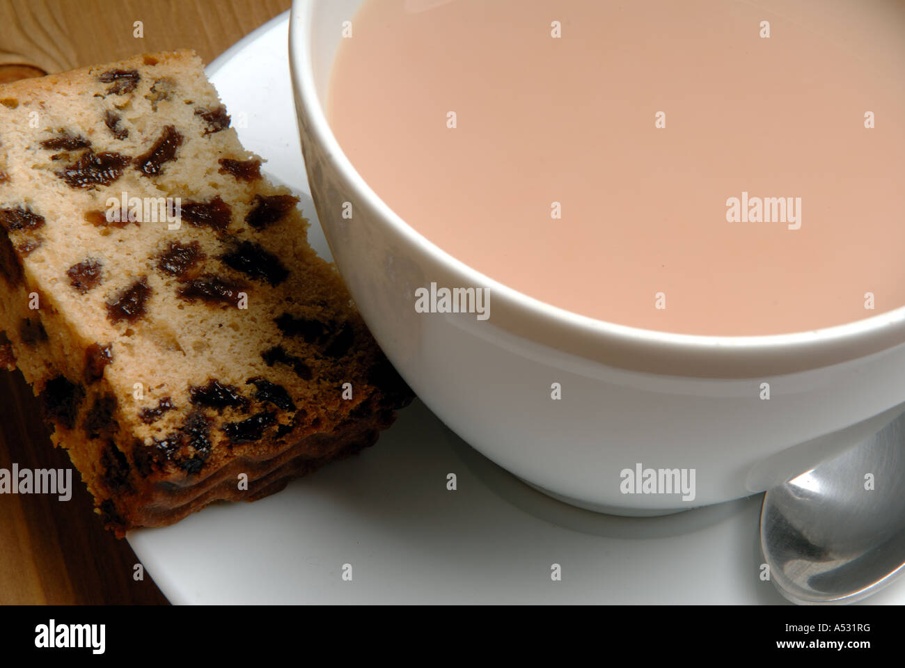 Tea with slice of cake Stock Photo - Alamy