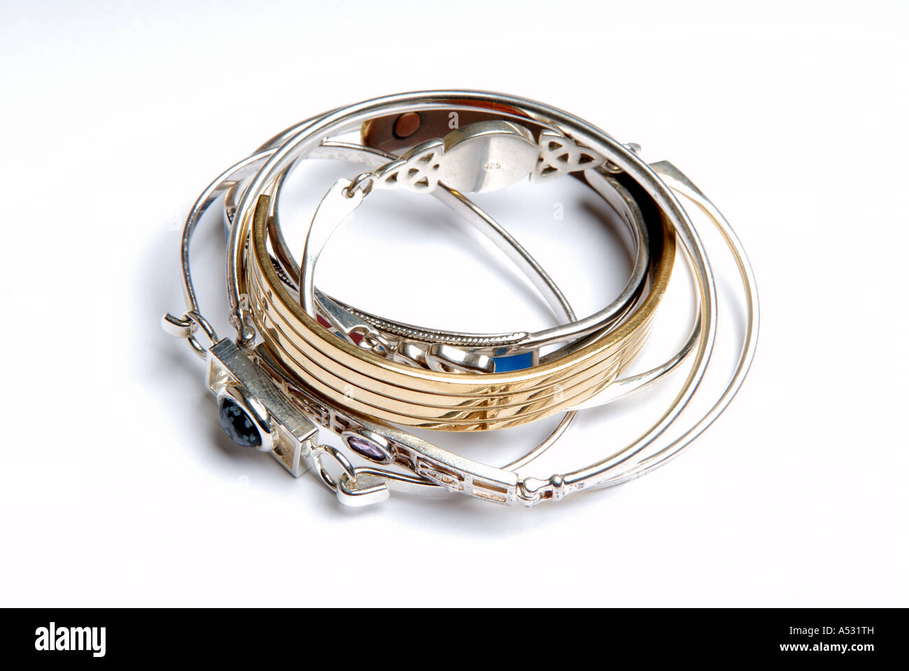 Bangles on white background Stock Photo - Alamy