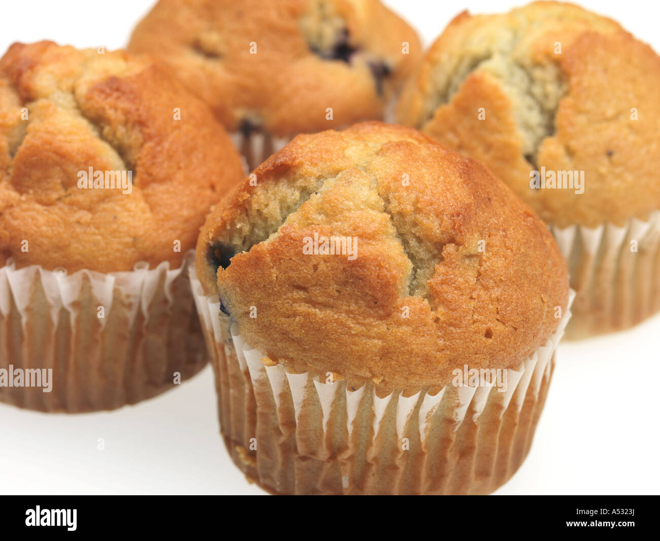 Freshly Baked Individual Blueberry Muffin Cakes Isolated Against A ...