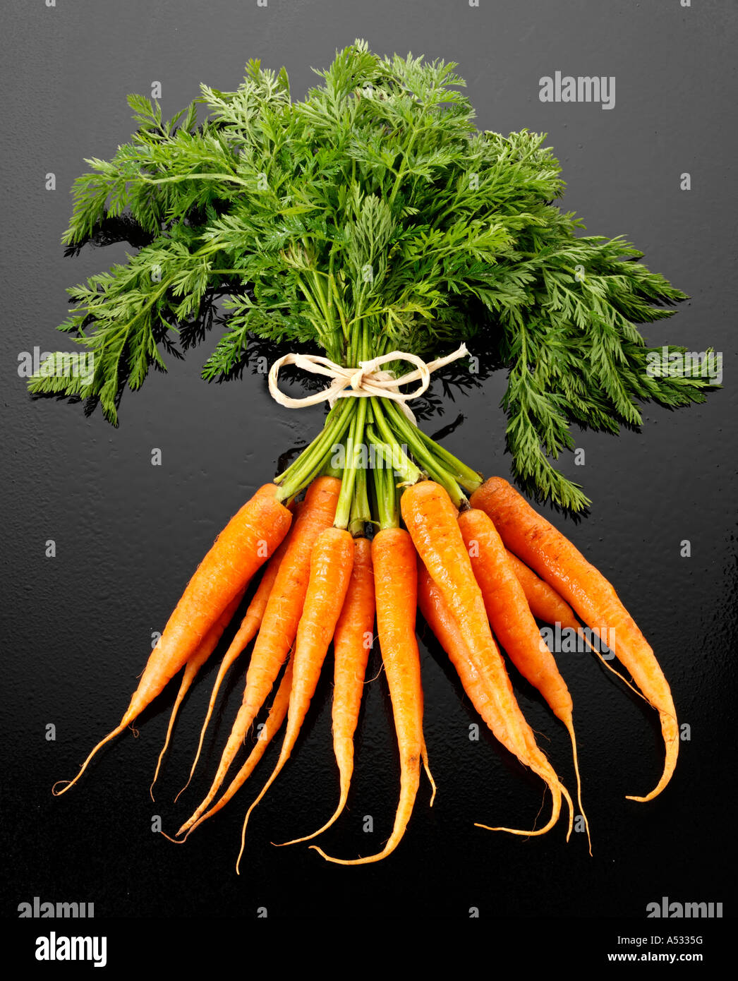 BUNCH OF CARROTS Stock Photo - Alamy