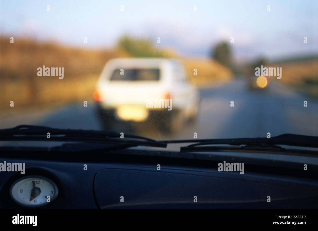 Car passing another car on a rural road in Sicily Stock Photo - Alamy