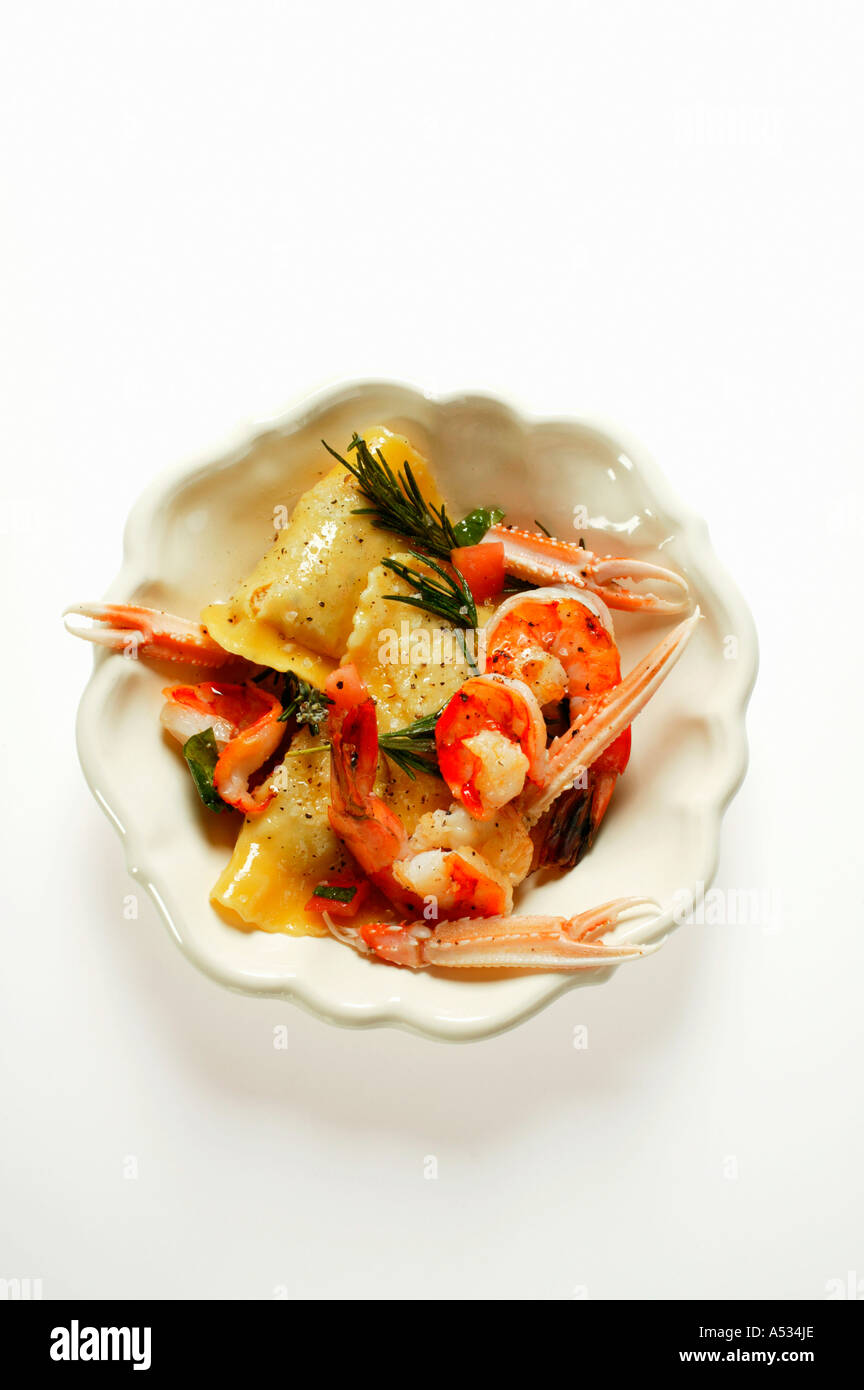 Ravioli with scampi and rosemary Stock Photo - Alamy