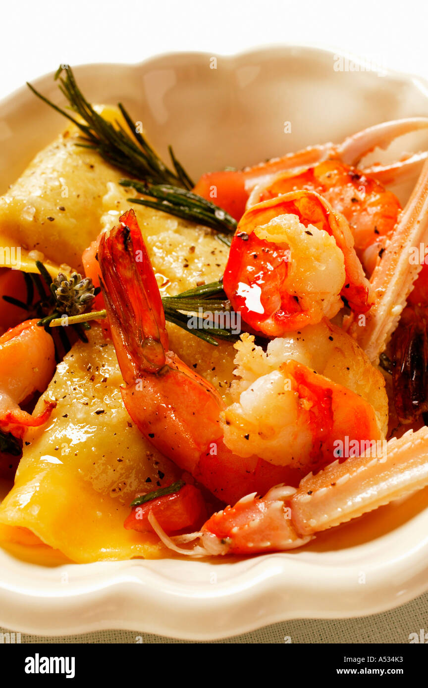 Ravioli with scampi and rosemary close up Stock Photo - Alamy