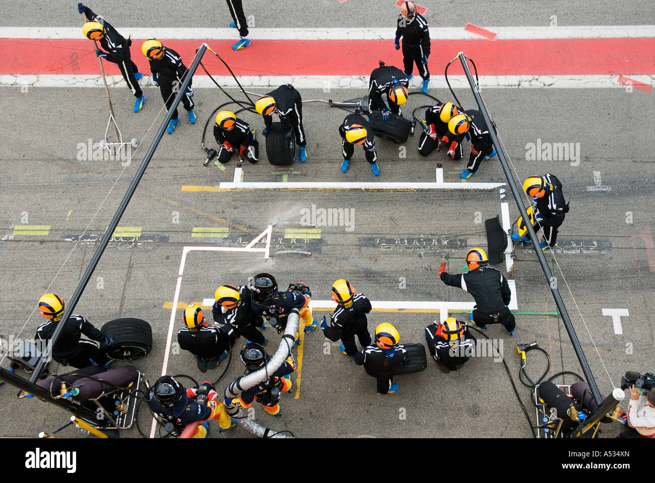 Renault Pit crew ready for a pit stop in February 2007 Stock Photo - Alamy