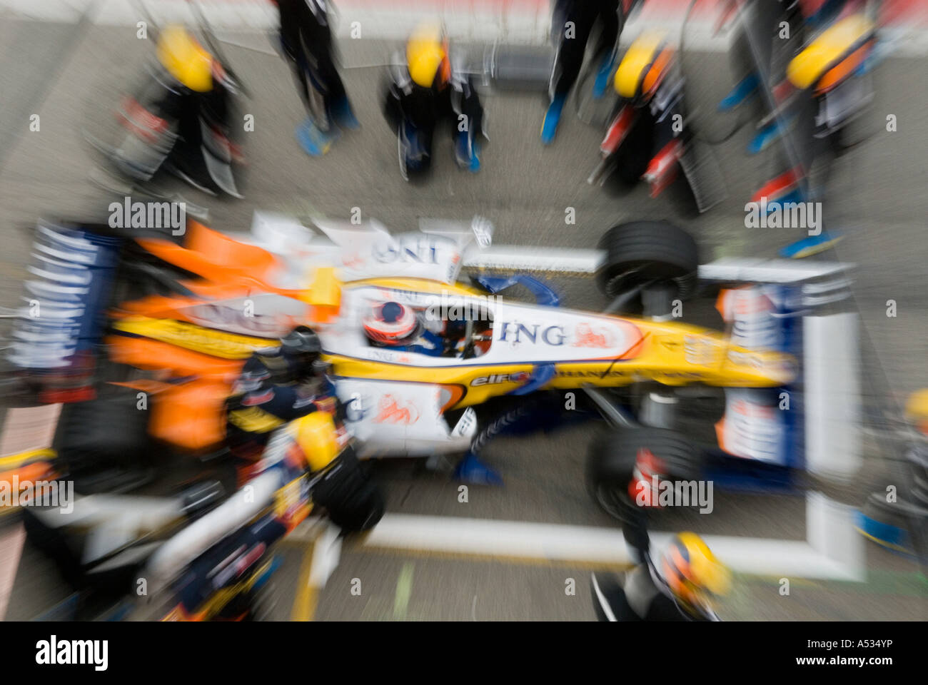 Heikki Kovalainen (FIN) makes a pit stop in the Renault R27 during ...