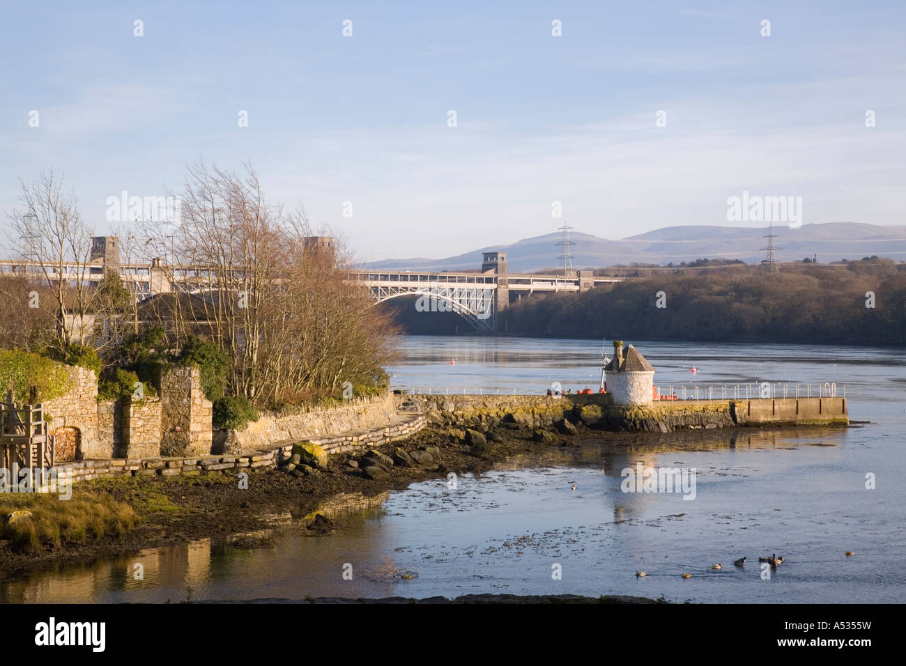 View to Pont Britannia Bridge and Isle of Anglesey Coastal Path beside ...