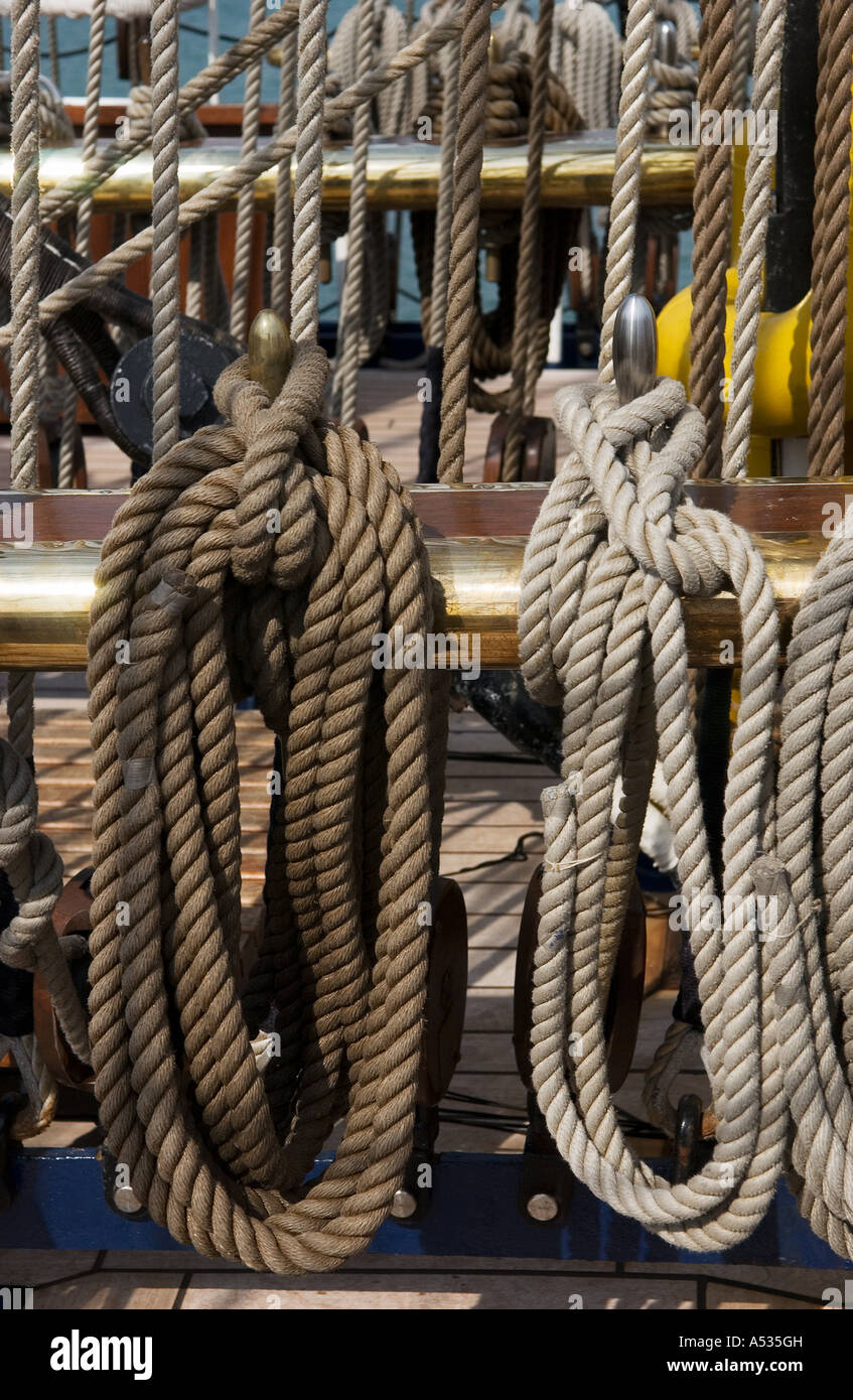 rolled up ropes on old sailing ship Stock Photo - Alamy