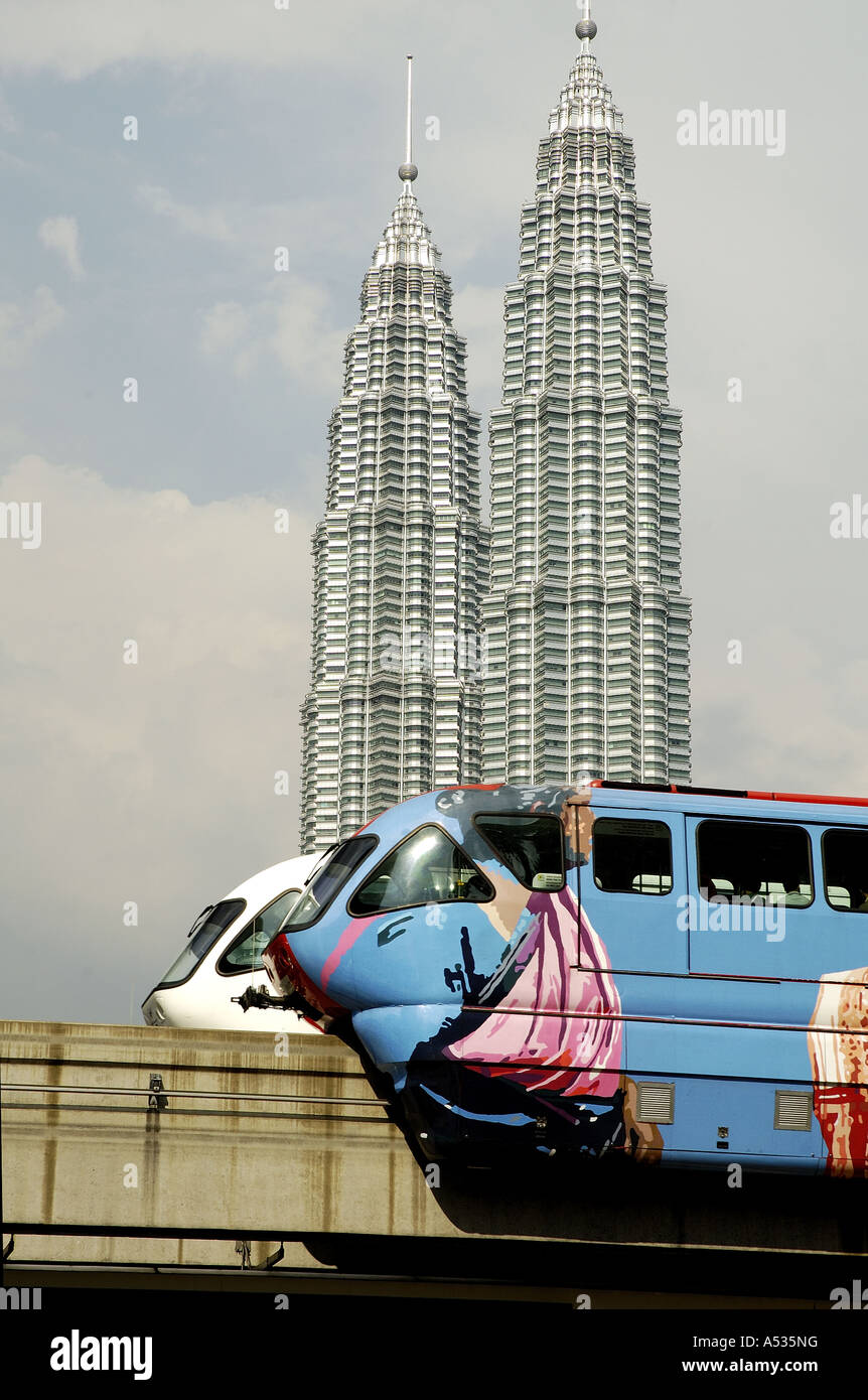 Monorail travelling in front of the Petronas Twin Towers in Kuala ...