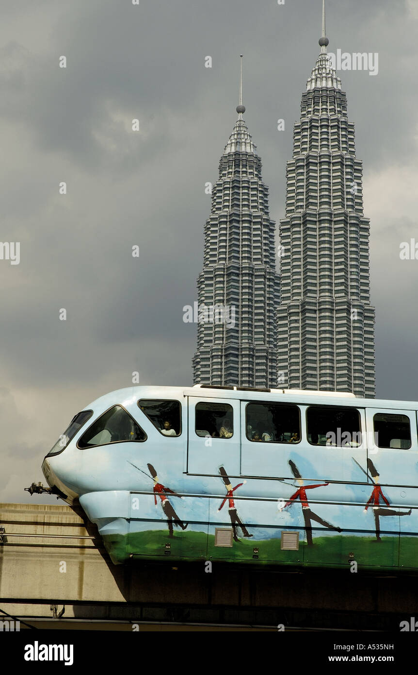 Monorail travelling in front of the Petronas Twin Towers in Kuala ...