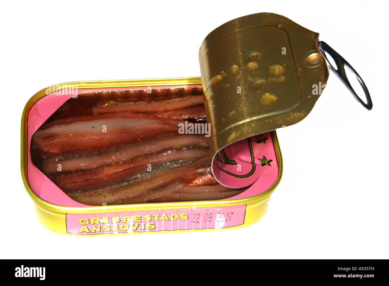 Tinned sprats cured in brine on white background Stock Photo - Alamy