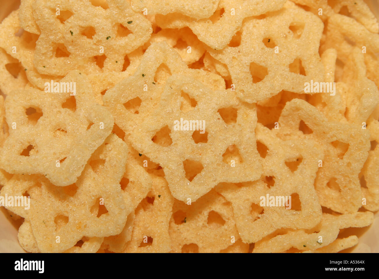 Texture of star shaped snacks Stock Photo - Alamy