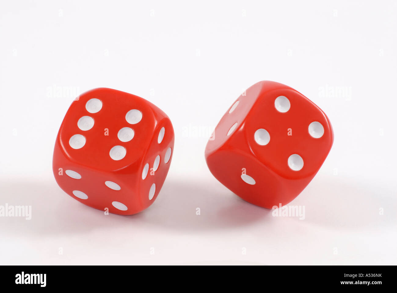 Pair of red dice Stock Photo - Alamy