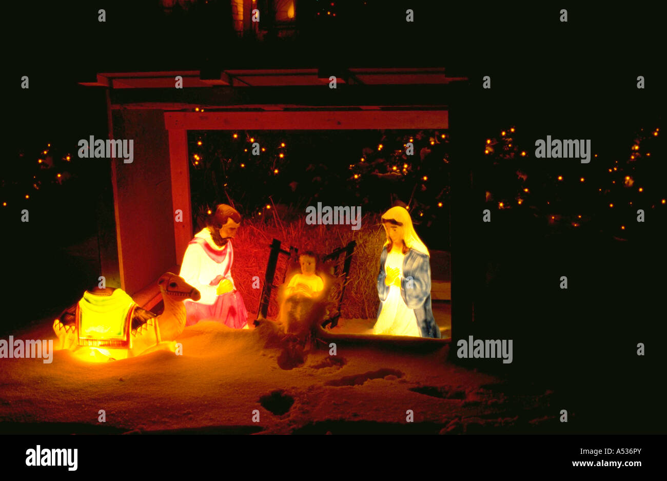 Outdoor Nativity manger scene in the snow with Jesus Mary and Joseph ...