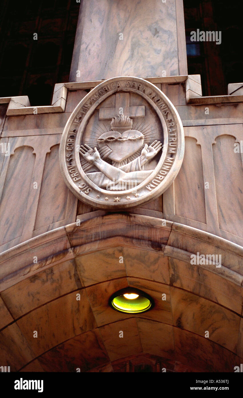 Catholic symbol above the door at the Catholic Church. Basilica of St ...