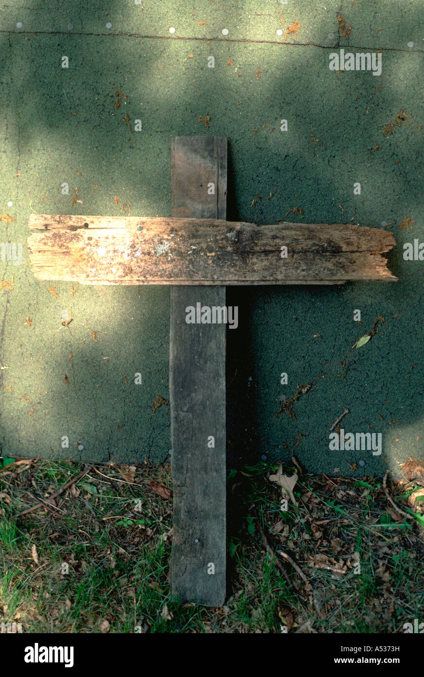 Wooden cross leaning wall hi-res stock photography and images - Alamy
