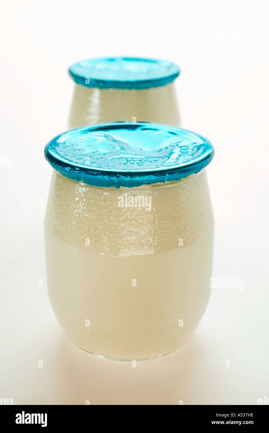 Two jars of yoghurt Stock Photo - Alamy