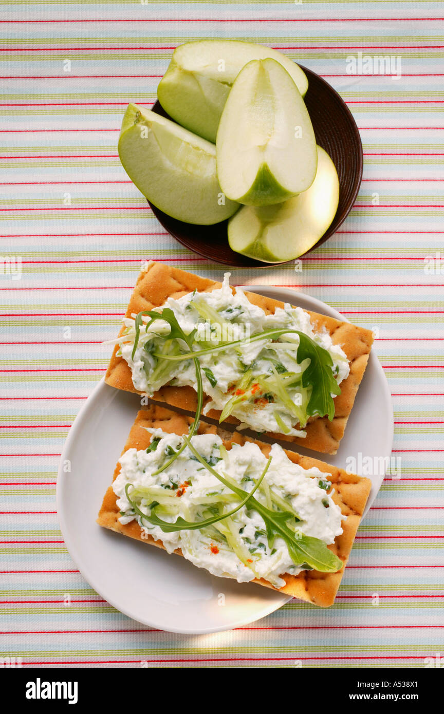 Crispbreads with quark and rocket fresh apple wedges Stock Photo - Alamy