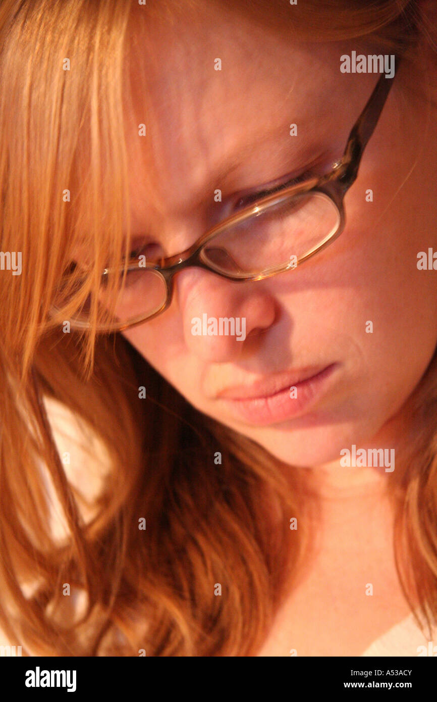 Portrait (Head Shot): Women Model - Concentrate/Thinking Stock Photo ...