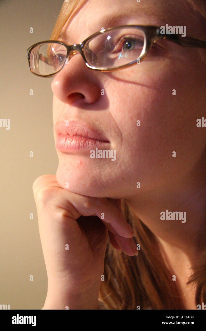 Portrait (Head Shot): Women Model - Concentrate/Thinking Stock Photo ...