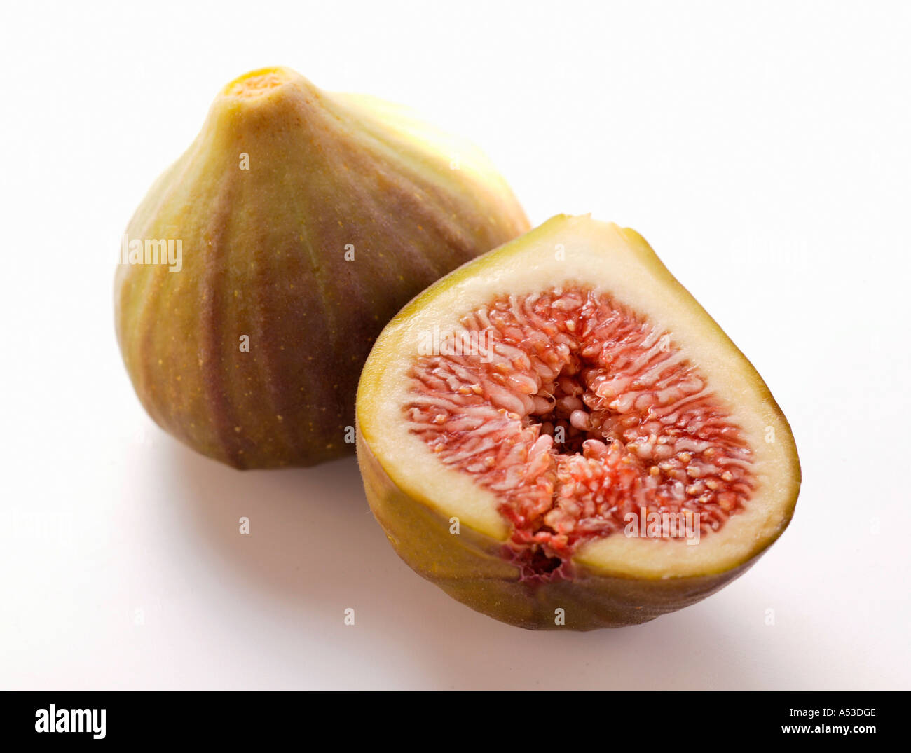Whole fig and half a fig Stock Photo - Alamy