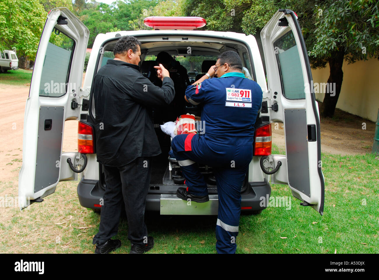 Ambulance with open doors taking patient to hospital, South Africa ...