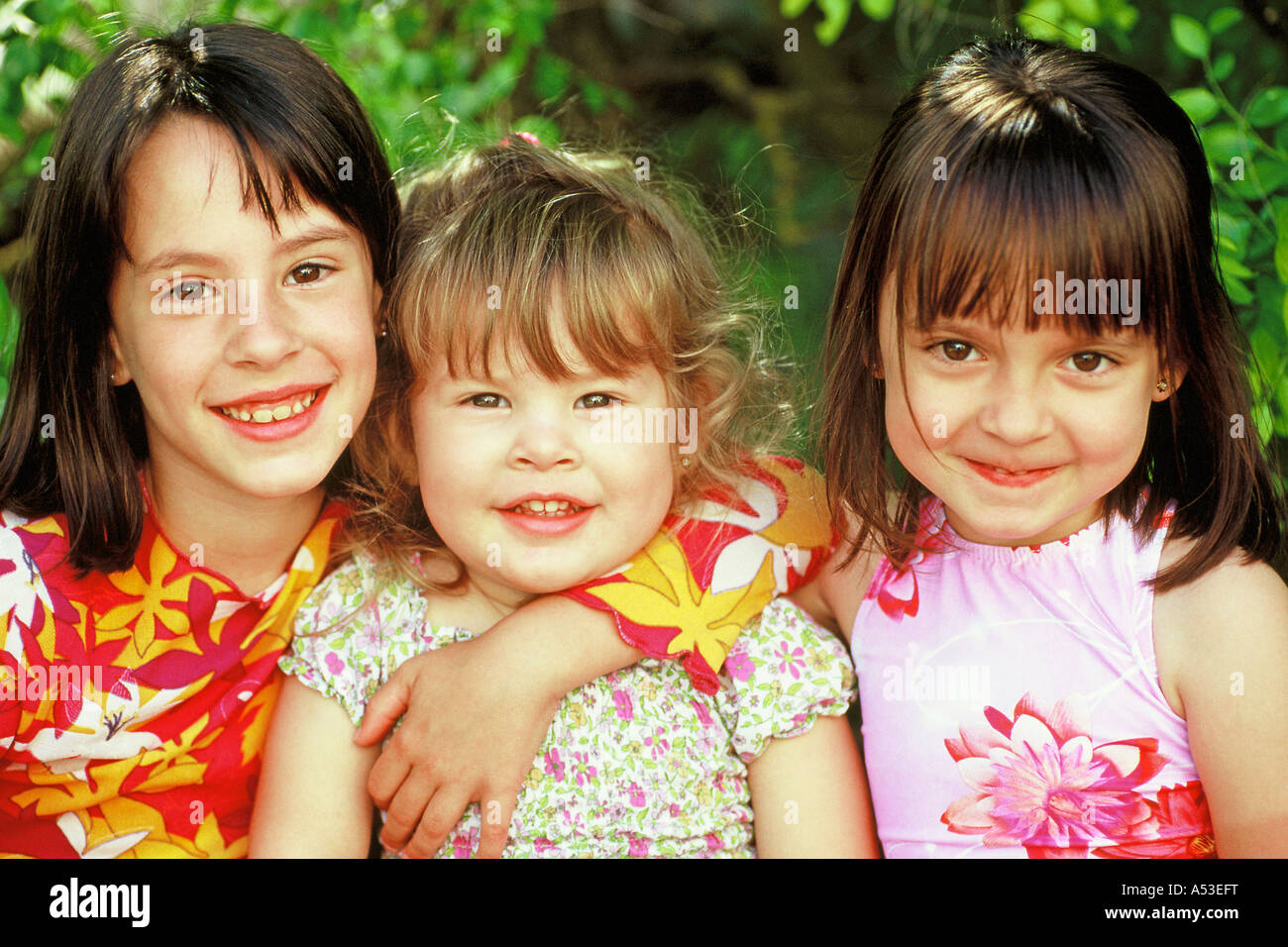 Three little girls Stock Photo - Alamy