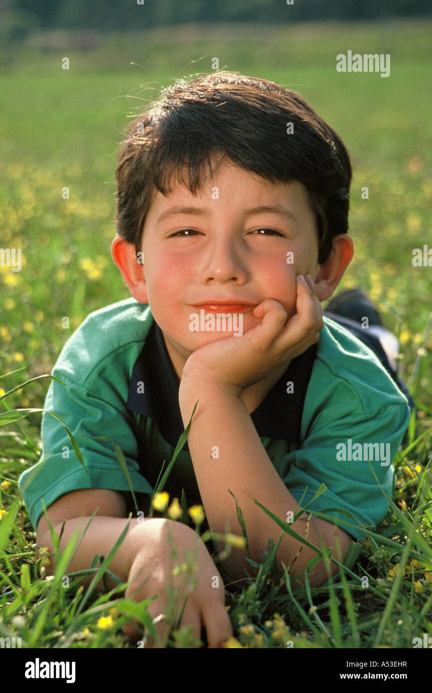 Little boy on grass Stock Photo - Alamy