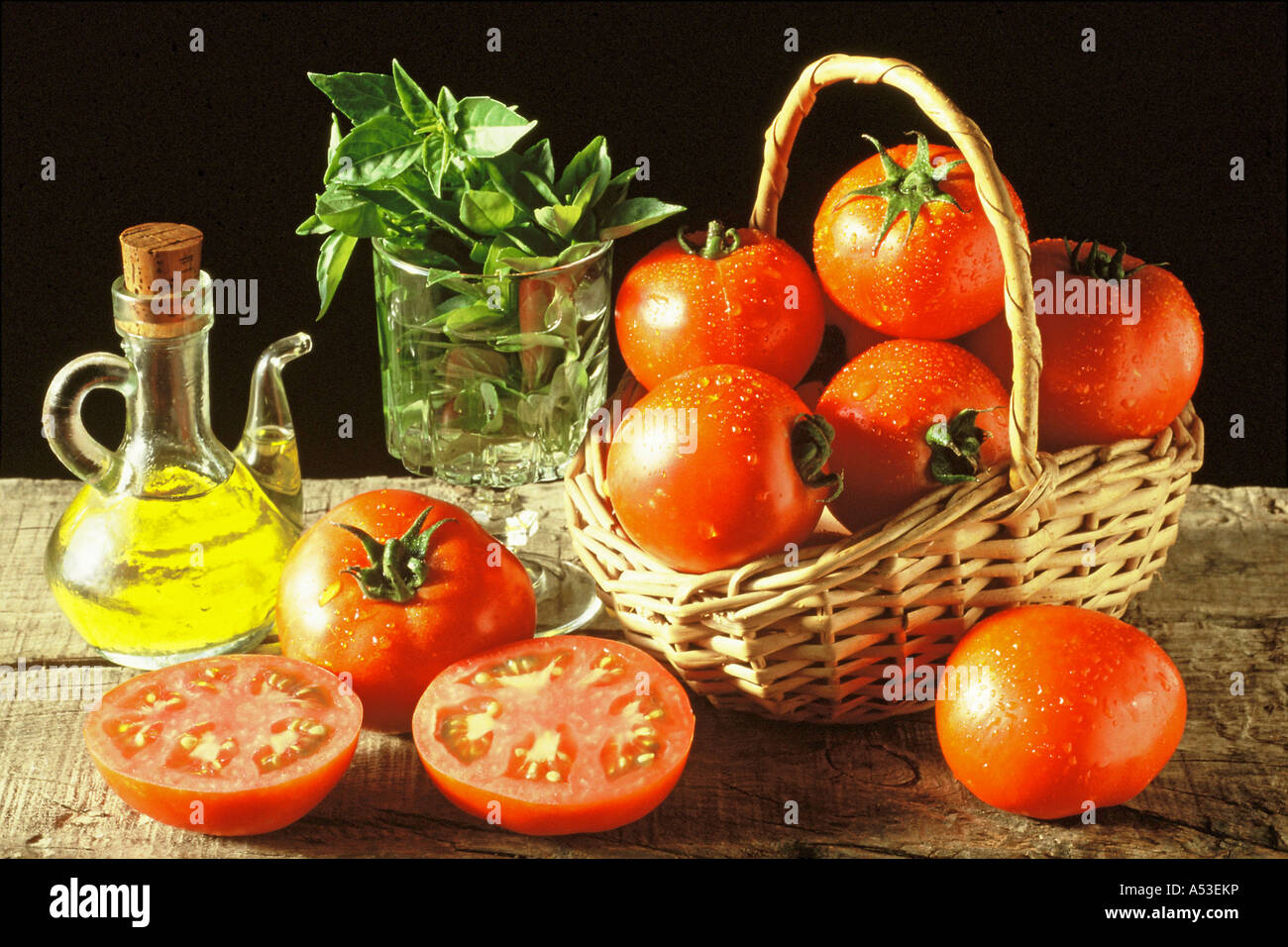 Tomatoes and olive oil Stock Photo - Alamy