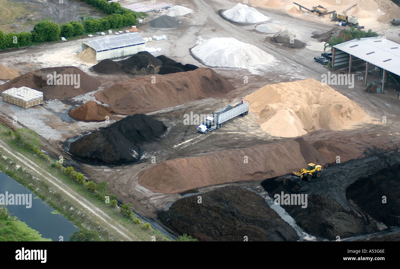 dirt of different colors various colours earth moving soil soils piles ...