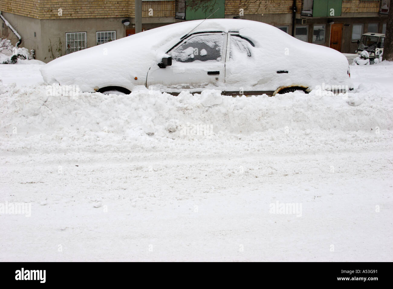 Over snowed car Stock Photo - Alamy