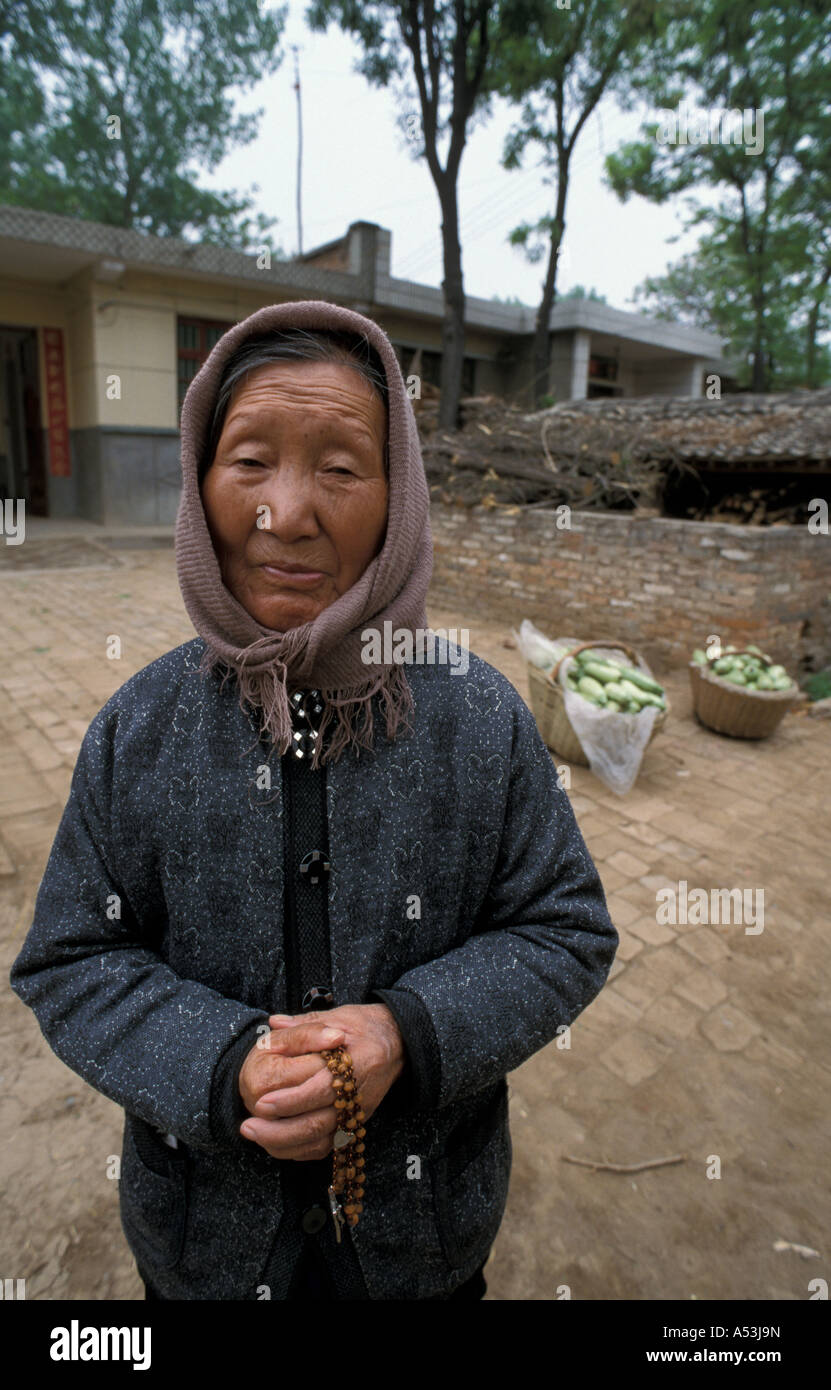 Painet ha1042 7104 elderly woman china catholic rosary xinghe village ...