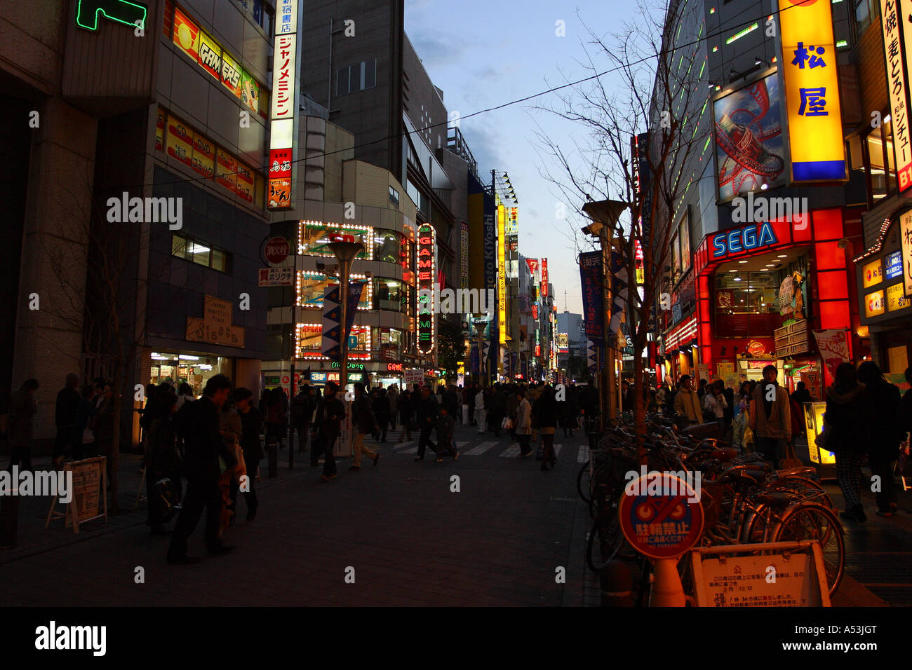 toyko japan travel TV game centre people play night street landscape ...