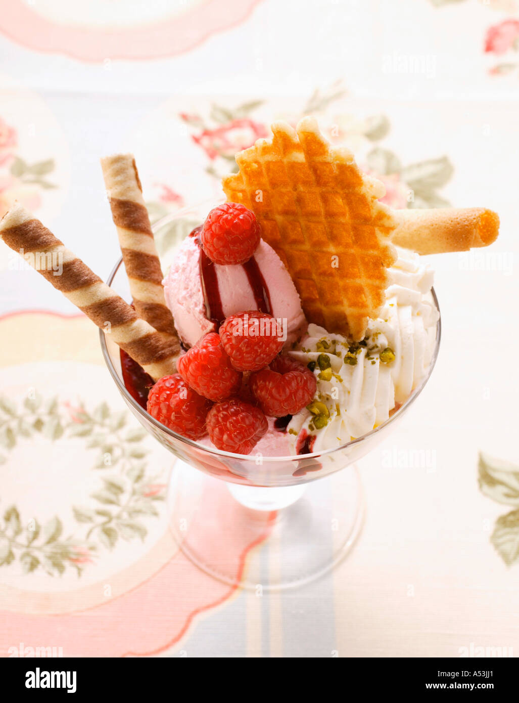 Sundae with raspberry ice cream cream and wafers Stock Photo - Alamy