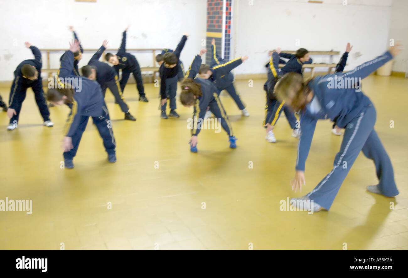 LEBANON BEIRUT Pre teens exercising with their class in a Beirut school ...
