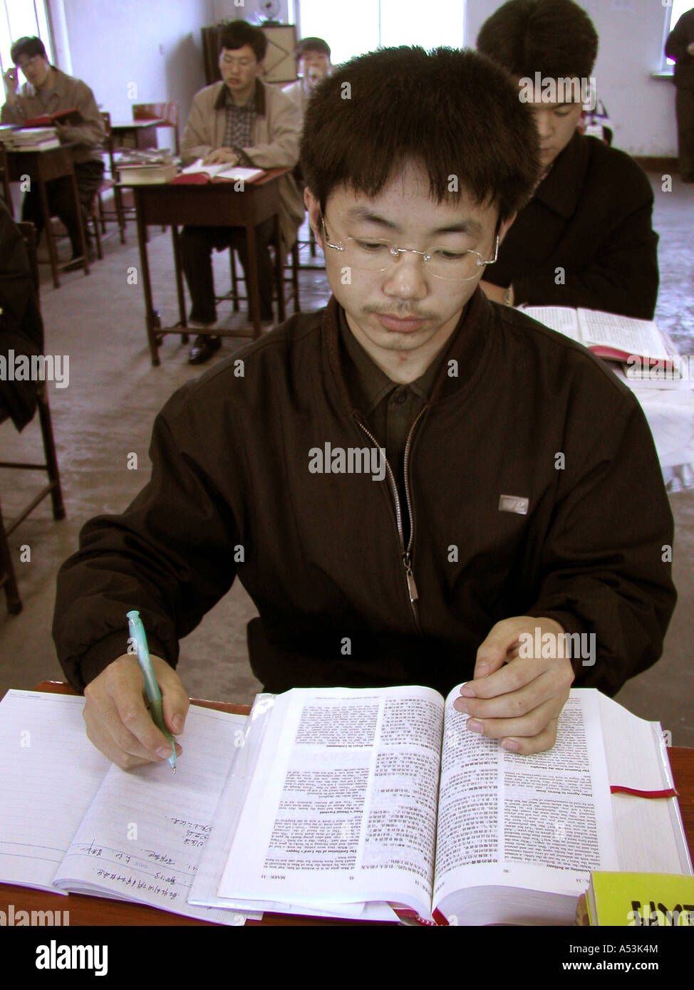 China boy writing hi-res stock photography and images - Alamy