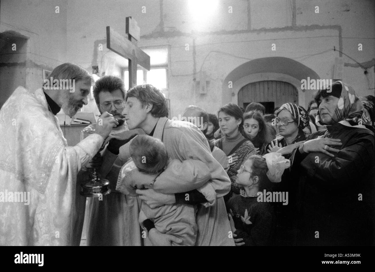 Painet ha1384 198 black and white religion father borisov giving ...