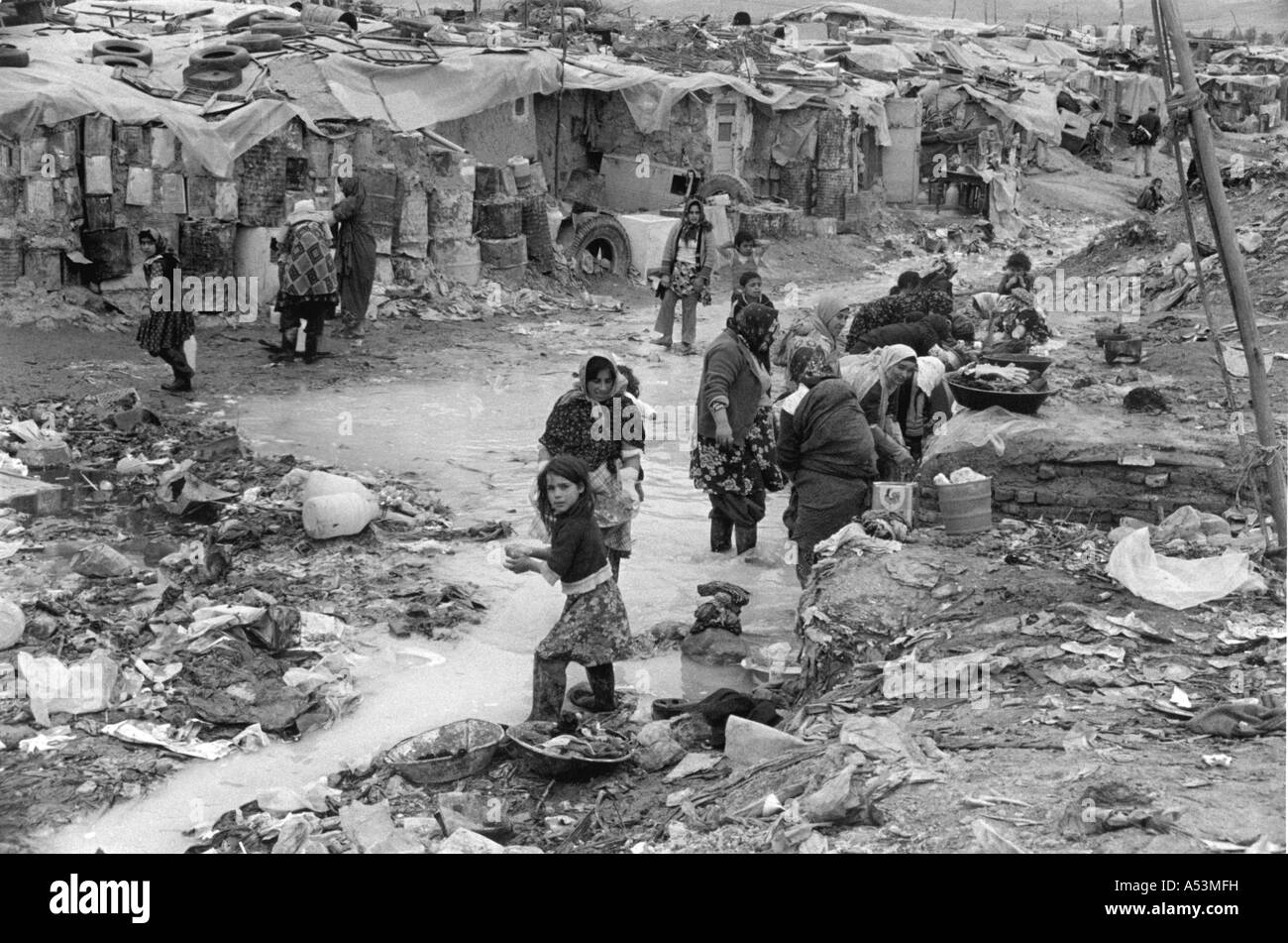 Painet ha1405 230 black and white poverty washing clothes dishes filthy ...