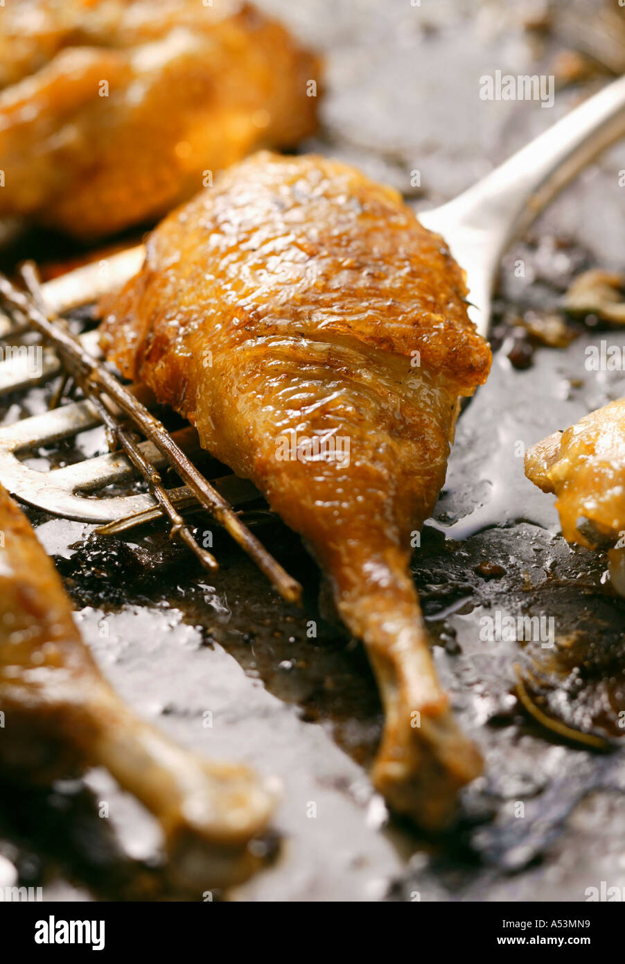 Crispy roast chicken legs on baking tray Stock Photo - Alamy