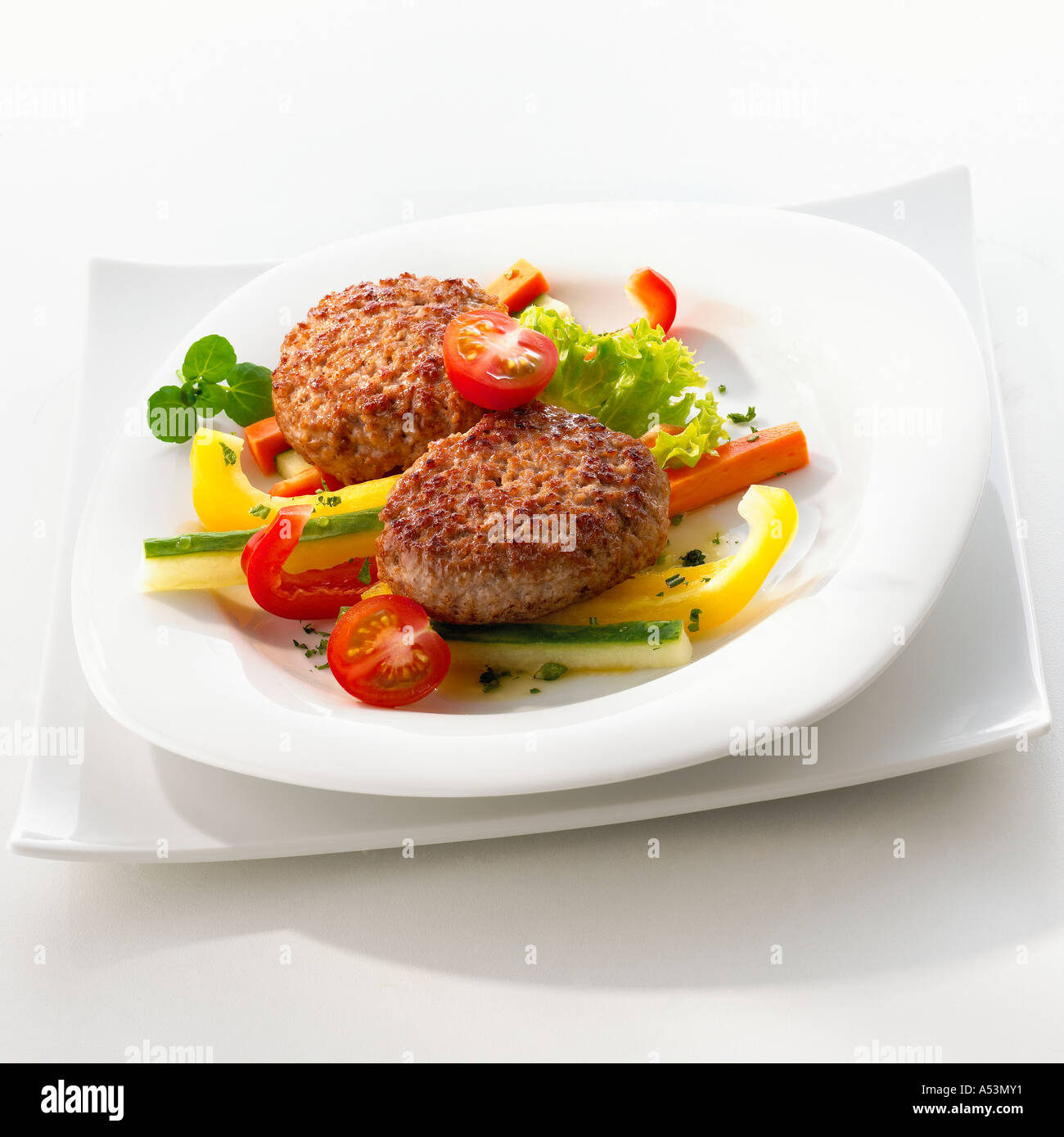 Rissoles with mixed vegetables Stock Photo - Alamy