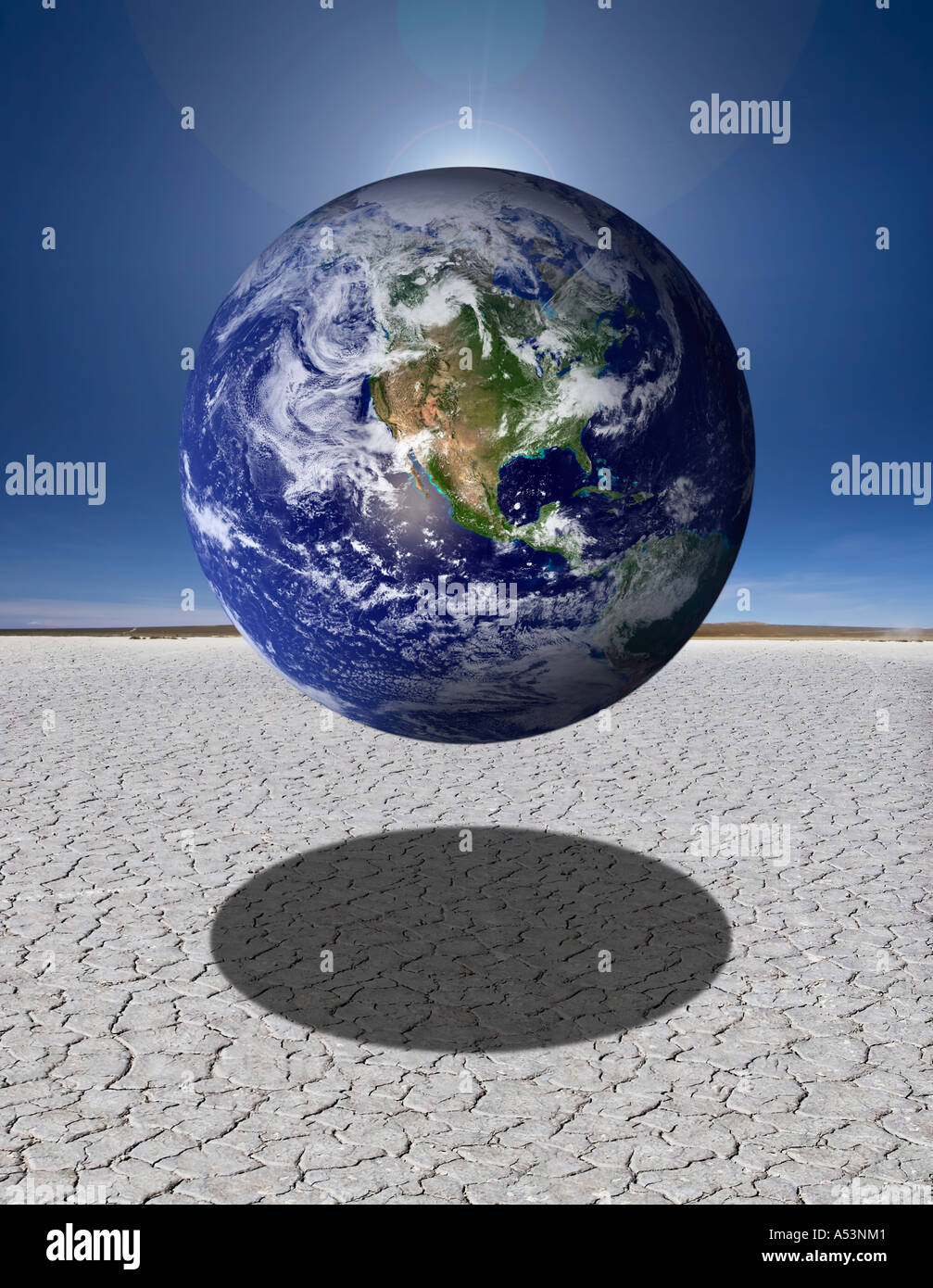 Earth floating above the desert Stock Photo - Alamy