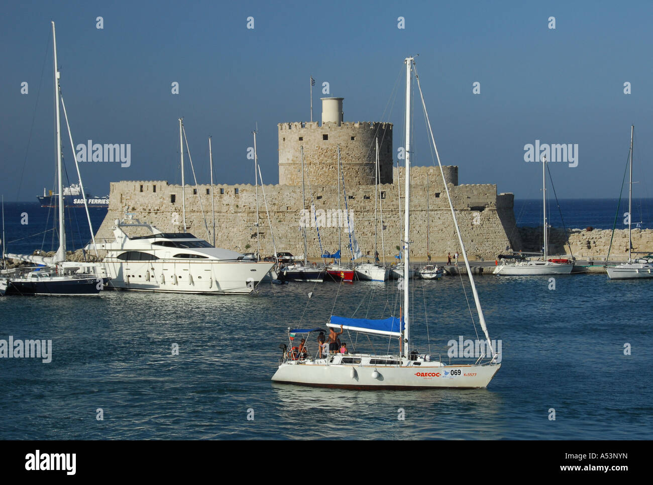 A pleasure boat passes the fortress of St Nicholas, which guards the ...
