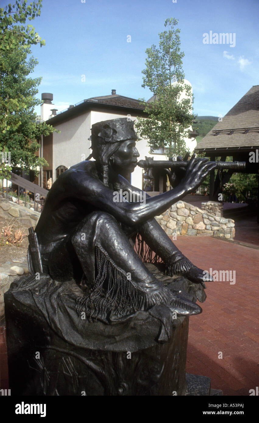 Metallic Statue, Of A Native American Indian Playing A Flute,In The ...