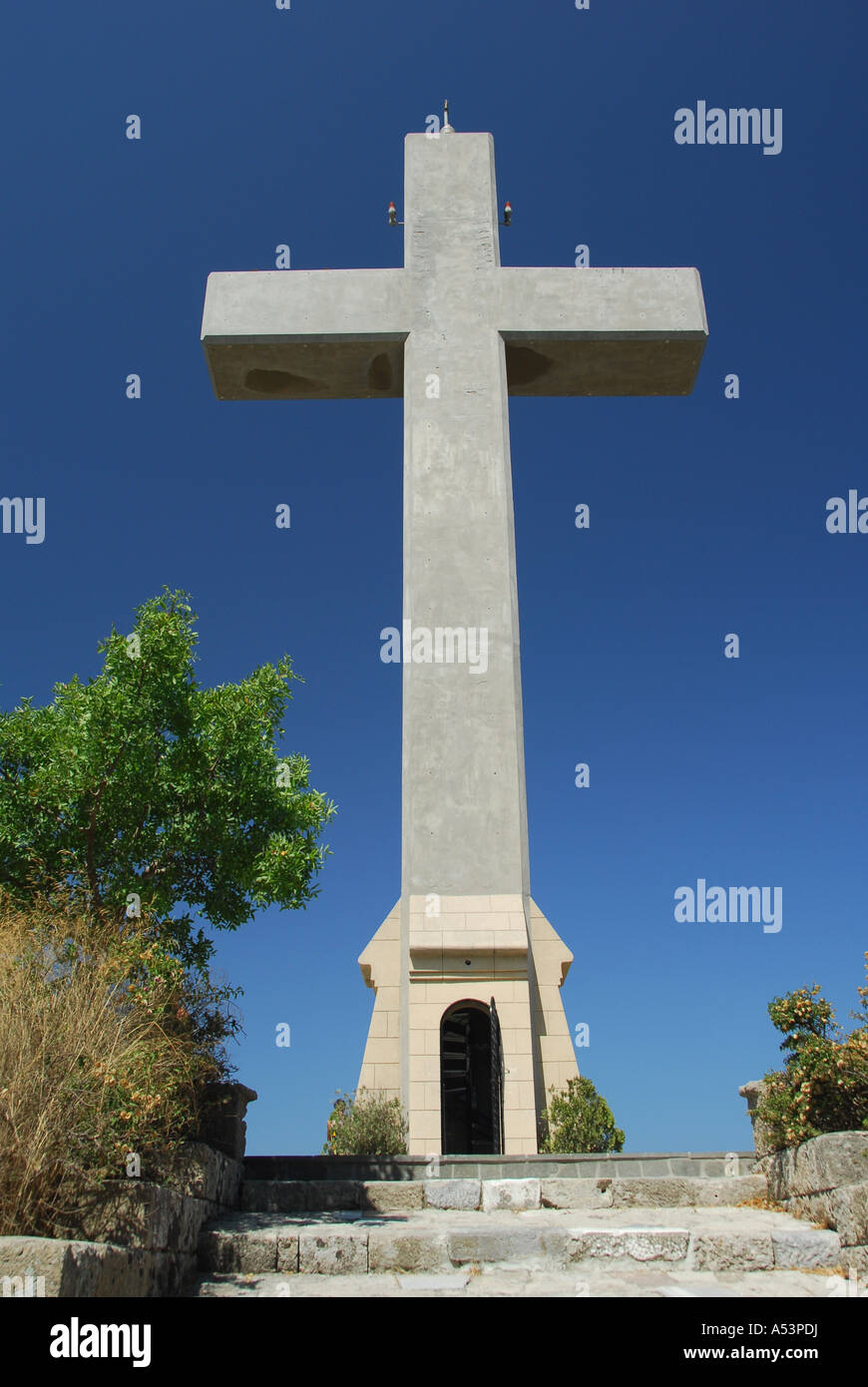 The giant cross on the hill at the site of the Monastery of Filerimos ...