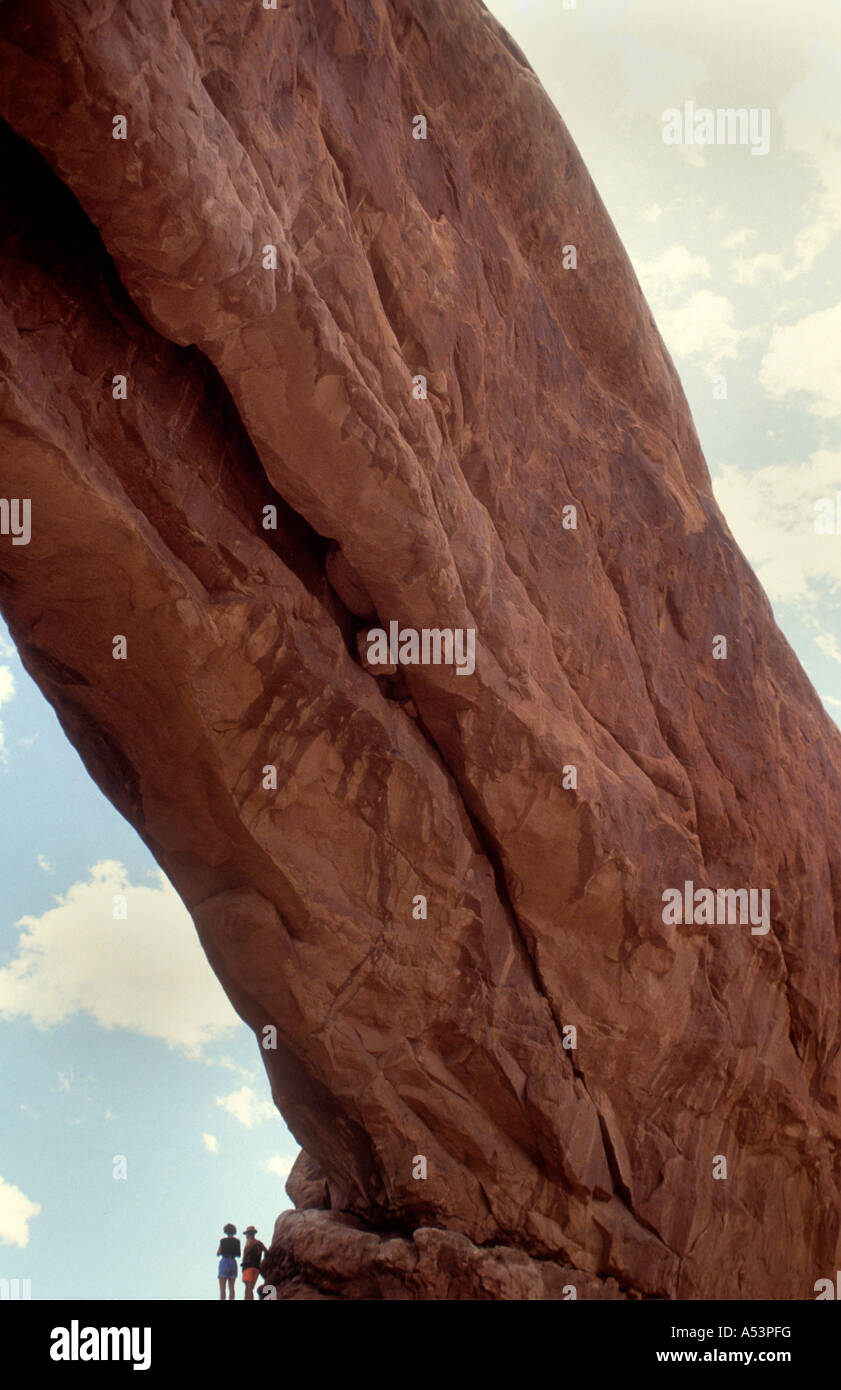 Tourists Standing Under One Of The Natural Arches,Inside Arches ...