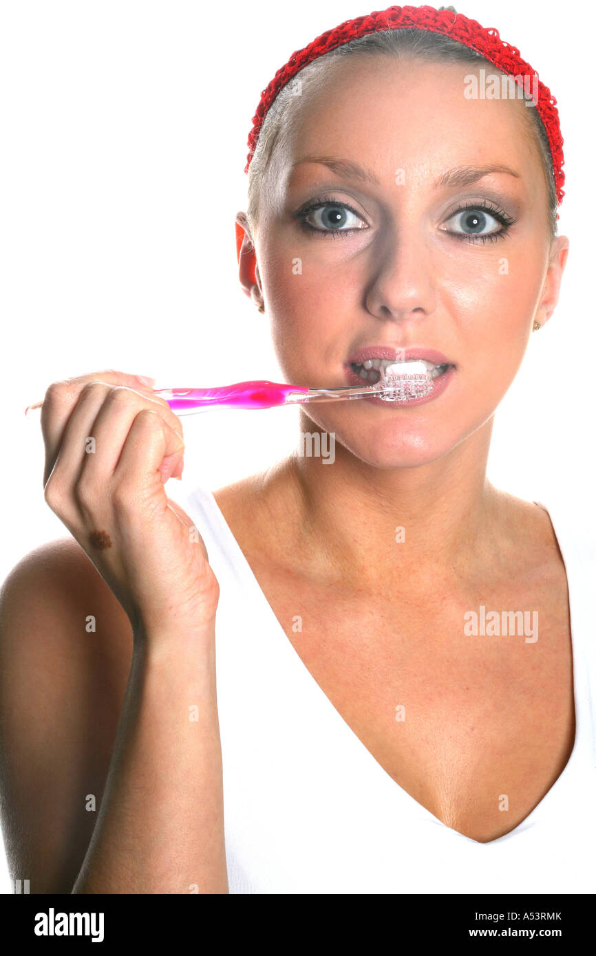 Young Woman Brushing Teeth Model Released Stock Photo - Alamy