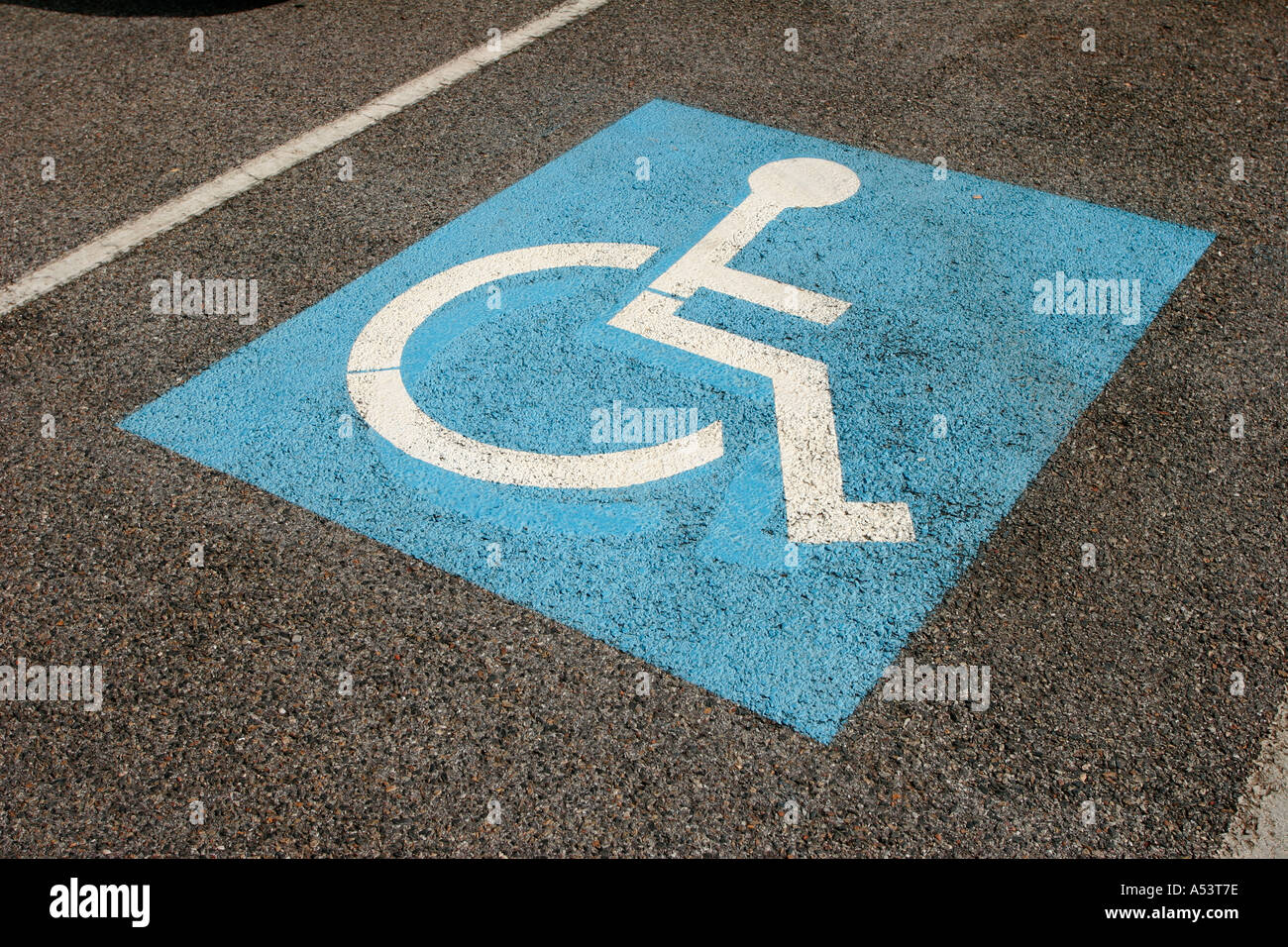 Disabled sign in a car parking space Stock Photo - Alamy