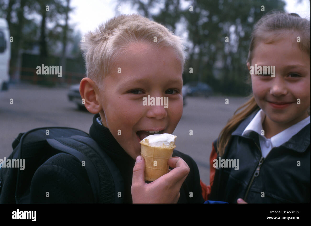 Painet ha2312 5135 russia children boy eating ice cream irkutsk siberia ...