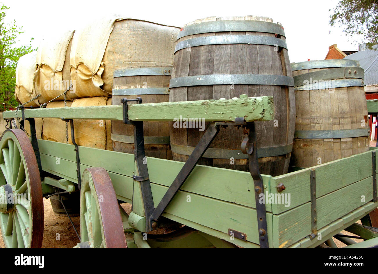 old wagon with wool bales and barrels Stock Photo - Alamy
