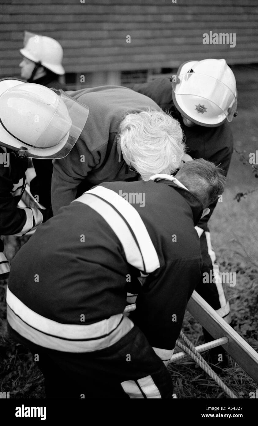 Firefighters rescuing elderly lady at Lewes floods East Sussex UK 2000 ...