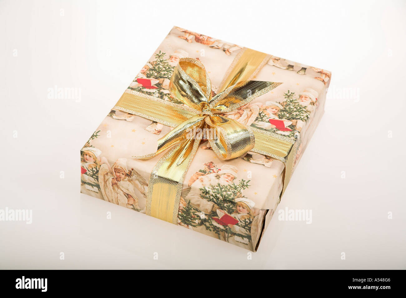 Present cut out in front of white background Stock Photo - Alamy